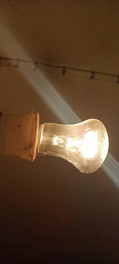 Glowing Light Bulb with Radiant Beams Stock Image - Image of decor ...