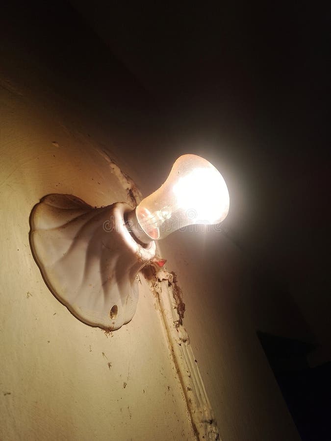 Glowing Light Bulb with Radiant Beams Stock Image - Image of glass ...