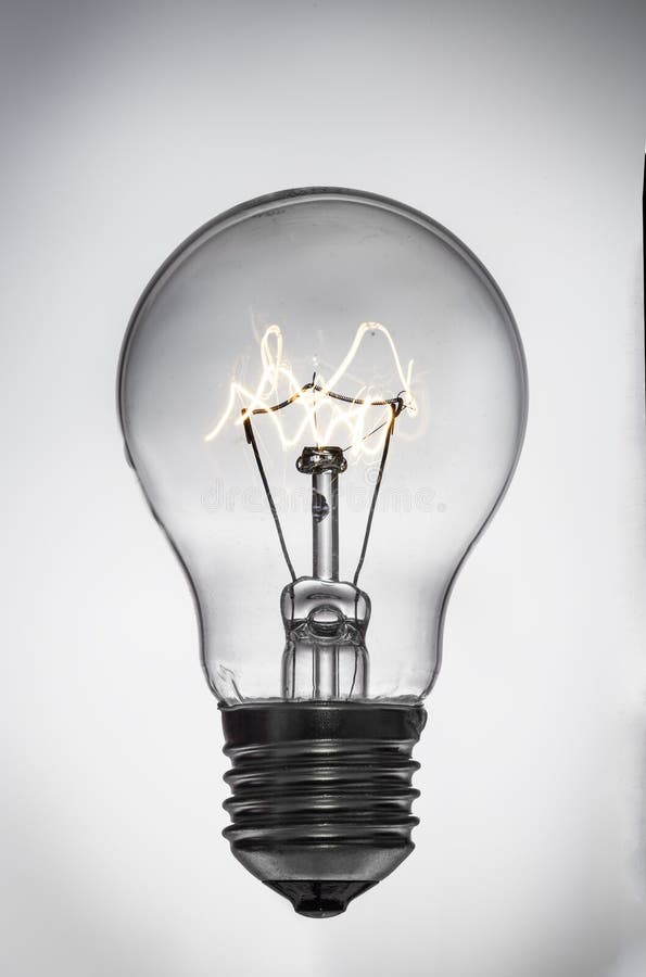 Glowing light bulb stock image. Image of illumination - 60718117