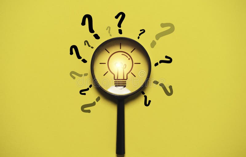 Glowing Light Bulb Inside Magnifier Glass among Question Mark for Focus and Concentrate of ...