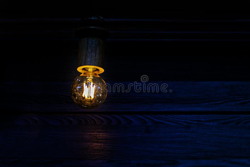 Glowing Light Bulb from an Inverter or Generator. Energy Stock Image ...