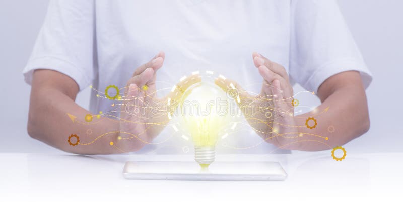 Glowing Light Bulb Over Laptop of Innovation Future Technologies and ...