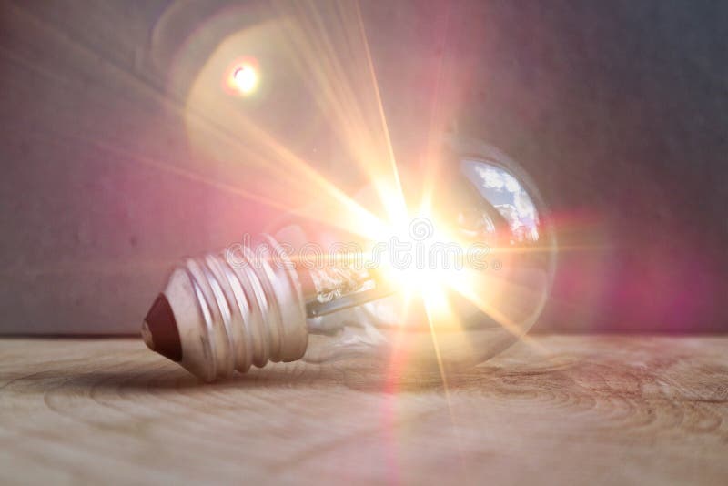 Glowing light bulb stock photo. Image of background, achievement - 92049992