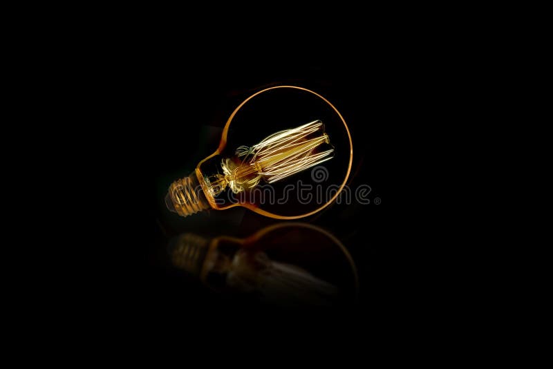 Glowing Light Bulbs on Black Background Stock Photo - Image of ...