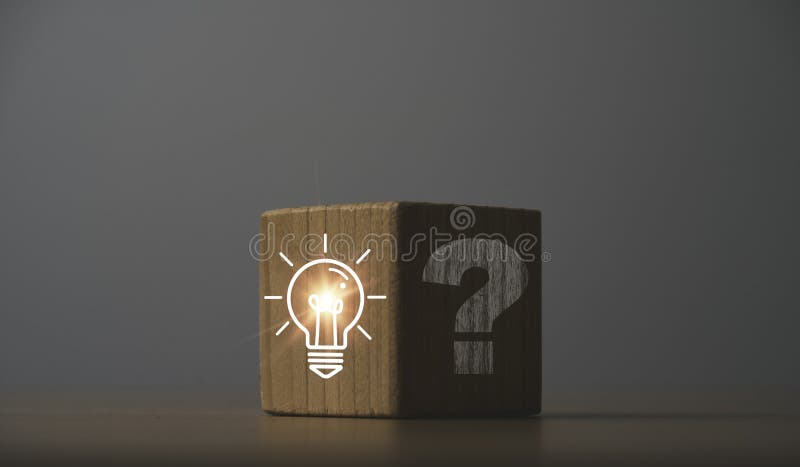 Glowing Lightbulb on Bright Side and Question Mark on Dark Side of ...