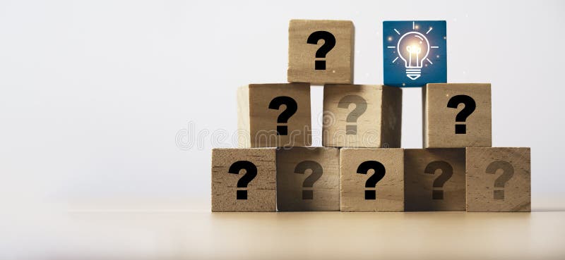 Glowing Lightbulb on the Top of Wooden Cube of Question for Problem ...