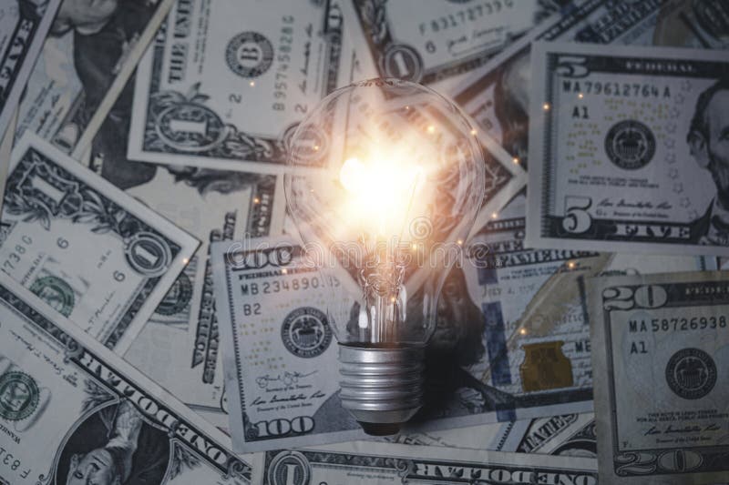 Glowing Lightbulb on USD Dollar Banknote for Creative Thinking Idea Can ...