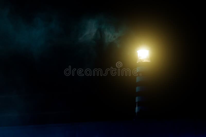 Glowing Lighthouse in the Fog at Night Stock Image - Image of hope ...