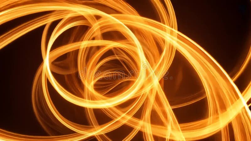 Glowing Loops of Light Against a Dark Backdrop Create an Ethereal and ...