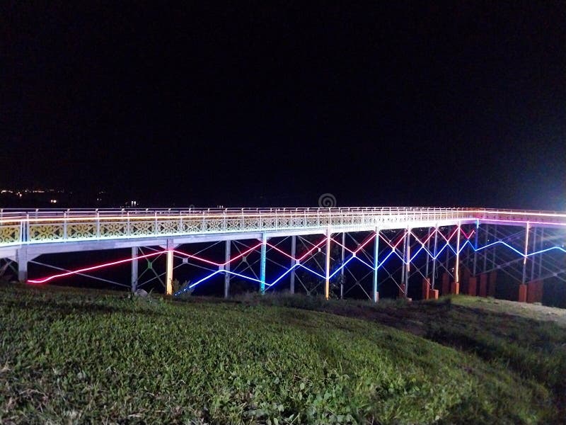 Glowing Material Bridge at Midnight in the City Stock Image - Image of ...