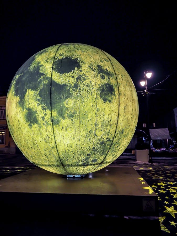 A Glowing Mock-up of the Moon on a City Street Stock Image - Image of ...