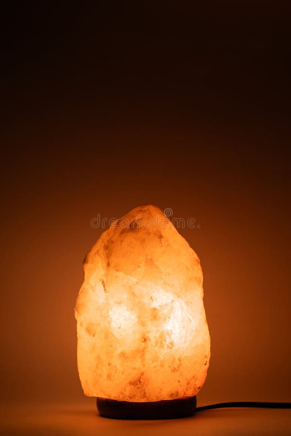 Glowing Pink Salt Lamp on Dark Background Stock Photo - Image of ...