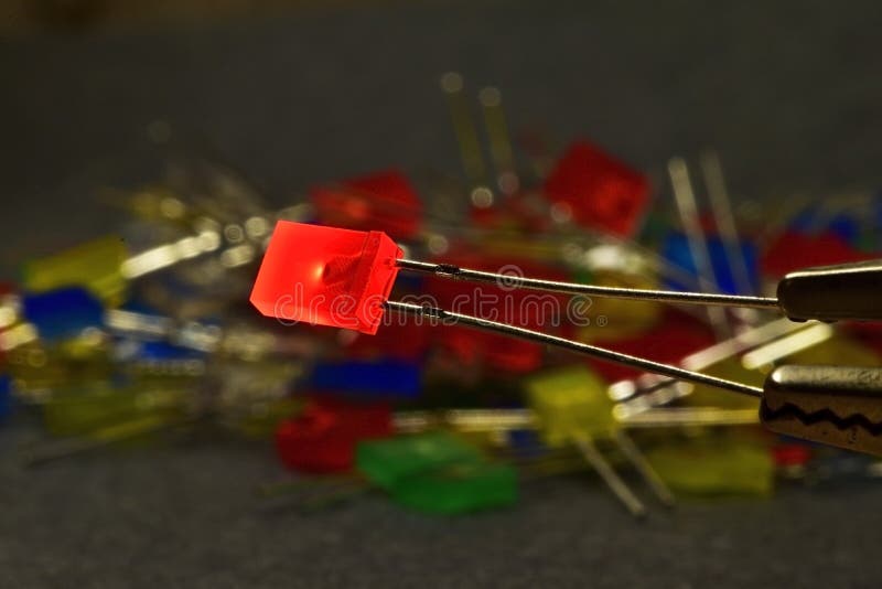 Glowing Red LED in a Rectangular Plastic Case Stock Photo - Image of ...