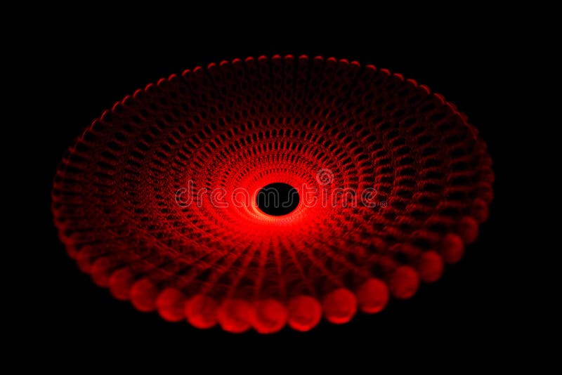 Glowing Red Light Traces in Form of Disc on Black Stock Photo - Image ...