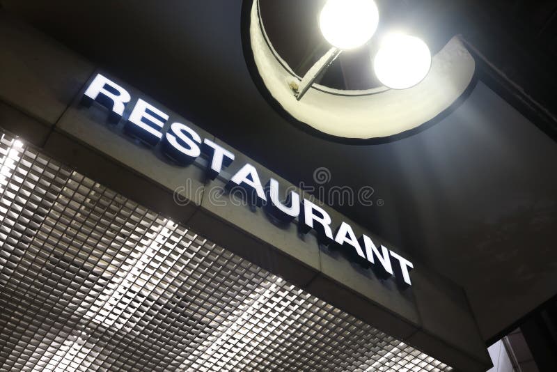 Glowing Restaurant Sign Board at Night Stock Photo - Image of icon ...