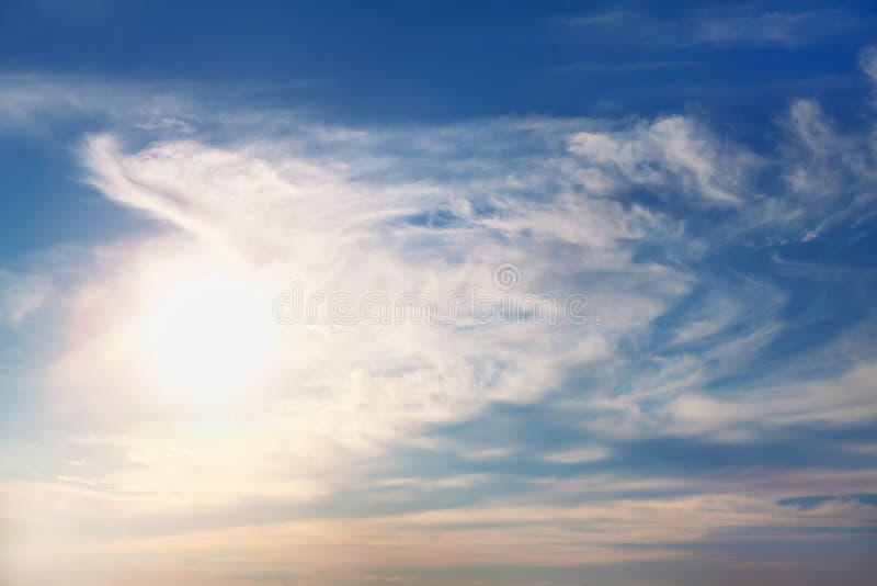 Glowing sun in hazy clouds stock photo. Image of landscape - 192044556