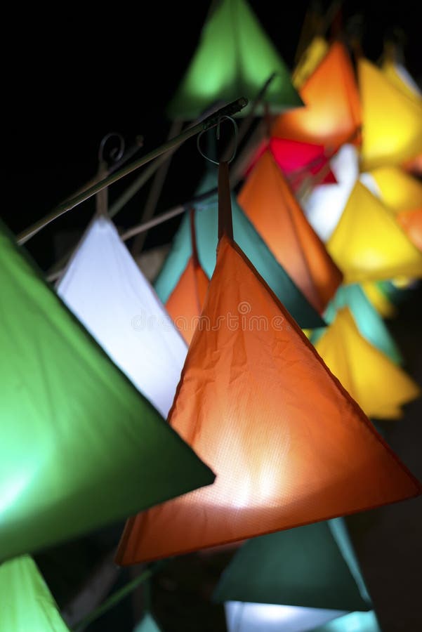 Glowing Triangular Paper Lanterns in the Dark Stock Photo - Image of ...