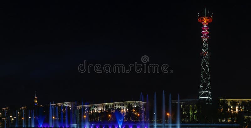 Glowing TV Tower at Night. Festive Illuminated Broadcast Tower. Space ...
