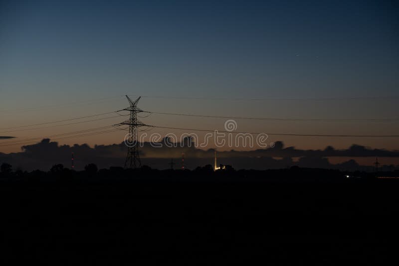 Glowing Wind Turbines with Their Red Lights on the Horizon in the Dark ...