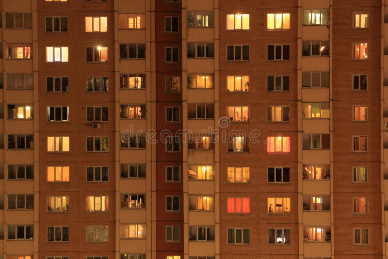 Glowing Windows in Multistory Modern Glass Residential Building Light ...