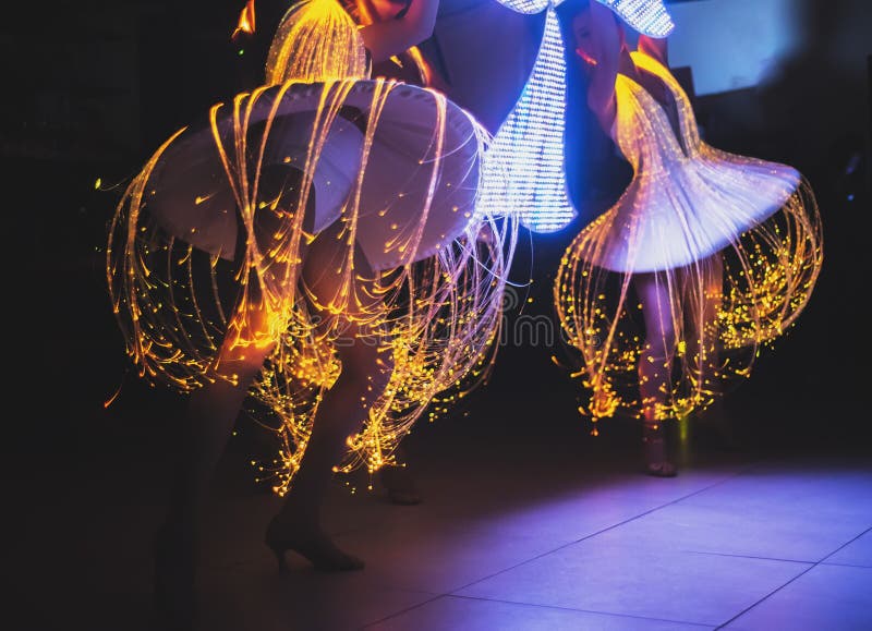 Glowing Yellow Dress at the Carnival Stock Image - Image of dancing ...