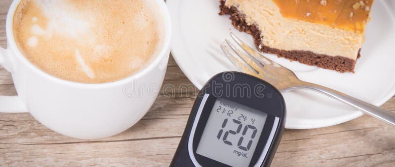 Glucometer, Portion of Cheesecake and Cup of Coffee with Milk ...