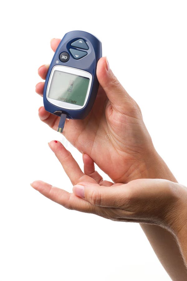 Glucometer in woman hands stock image. Image of hospital - 43479159