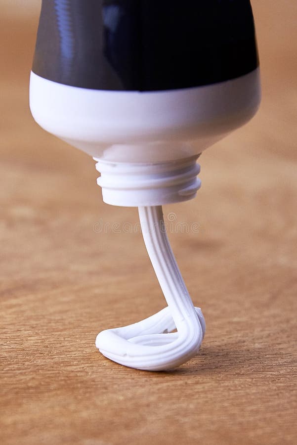 Glue from a Tube on a Wooden Surface, Construction Work Stock Image ...