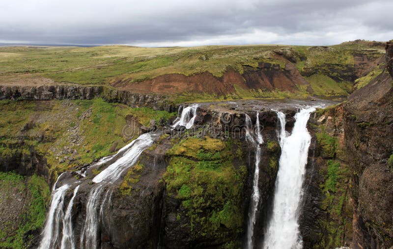 Glymur Waterfall at spring stock image. Image of cascade - 84130647