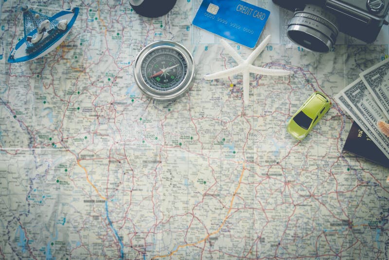 Go on an Adventure! the Map and the Camera on a Wooden Table. Stock ...