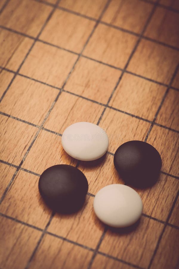 Go game detail stock image. Image of piece, black, tactic - 67632393
