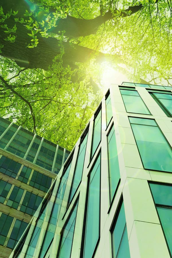 Go Green Concept. Low Angle View of Modern Building and Trees on Sunny ...