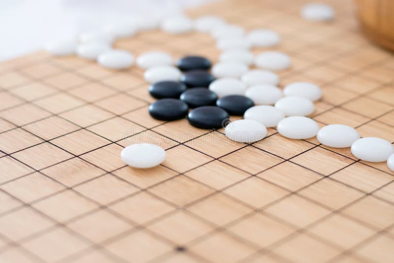 Go Pieces Placed on the Chessboard Stock Image - Image of ability ...
