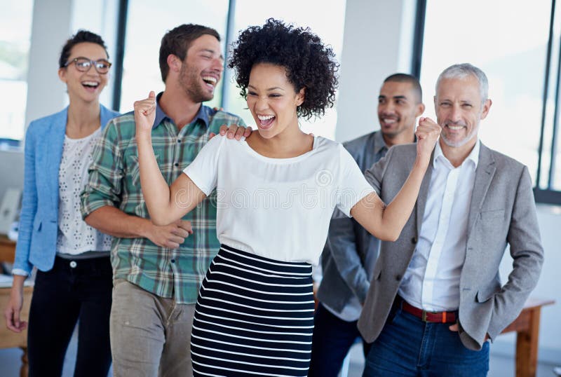 Go Team. a Group of Happy Coworkers Celebrating Standing in an Office ...