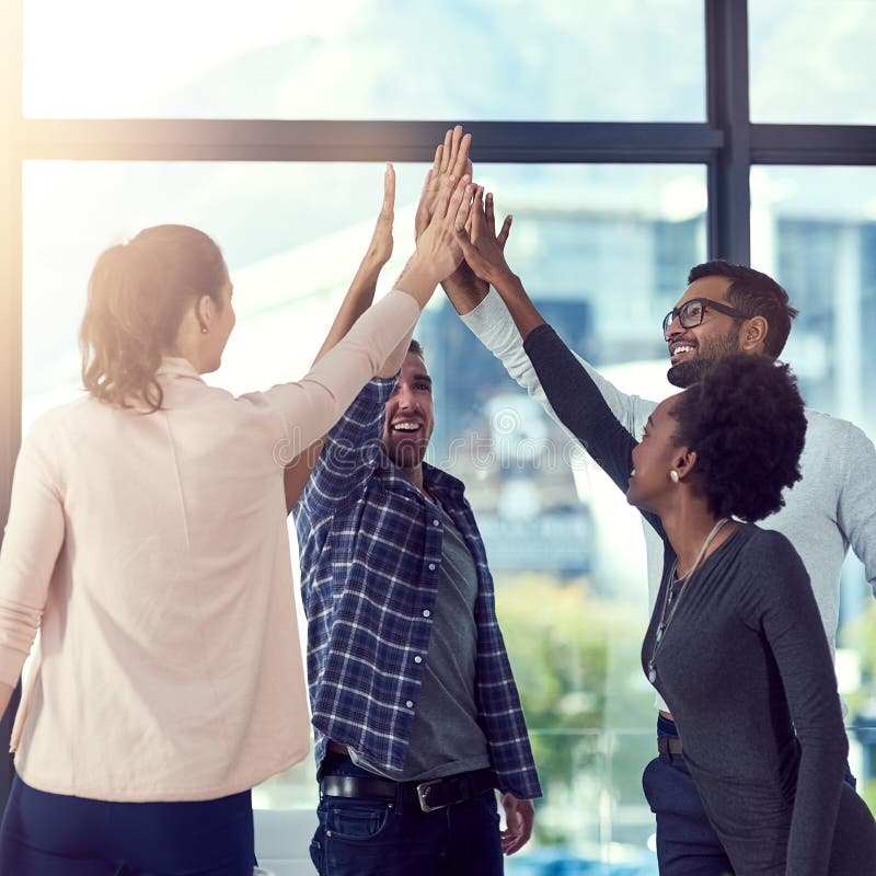 Go Team. a Group of People High Fiving in the Office. Stock Image ...