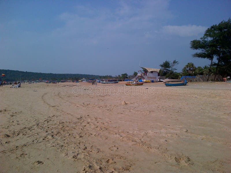 Goa beach sand stock photo. Image of boat, sand, beach - 197940436