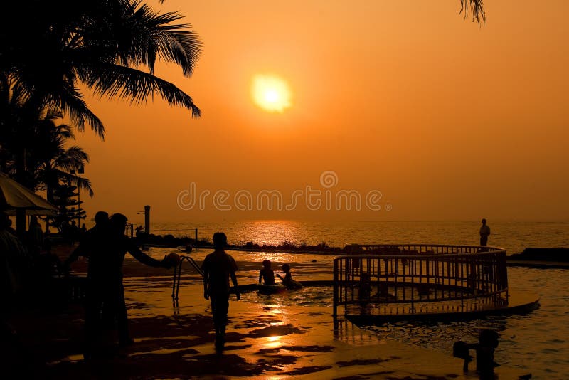 Goa Sunset stock image. Image of ocean, children, pool - 14121735
