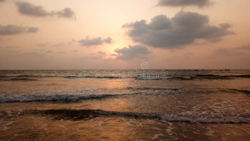 Goa sunset stock image. Image of sunset, candolim, beach - 96675373