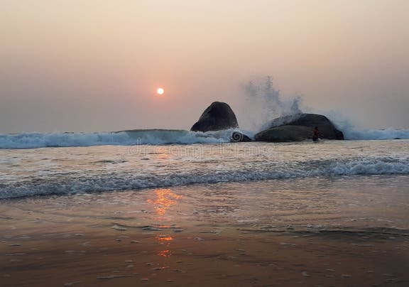 Goa stock photo. Image of sunset, waves, beach, wave - 117701846