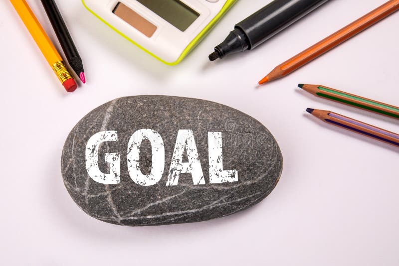 GOAL Concept. Gray Stone on a White Office Desk Stock Photo - Image of ...