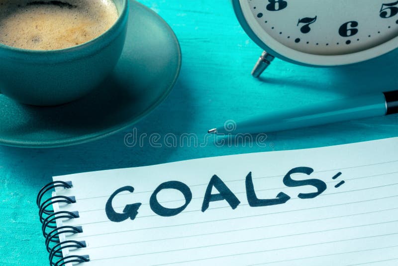 Goal Setting. a Notepad with the Handwritten Word on a Desk, with a Pen ...