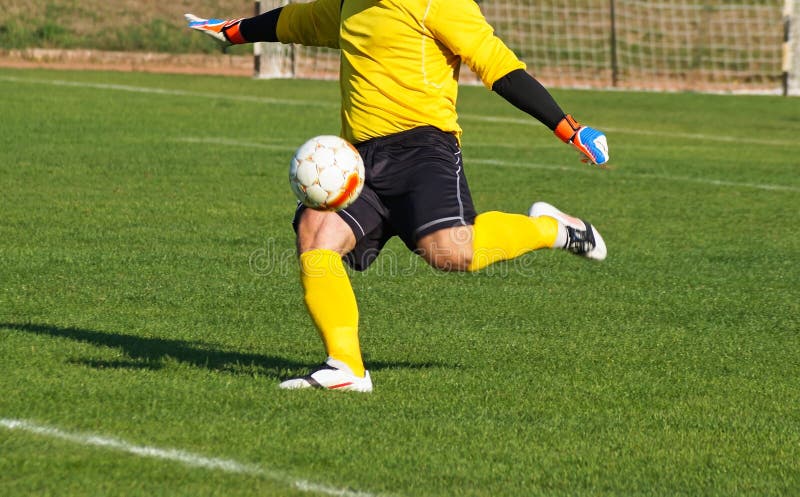 Goalkeeper with a ball stock image. Image of yellow, team - 61792629