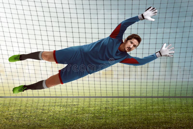 Goalkeeper catching ball stock image. Image of ball, football - 71447277