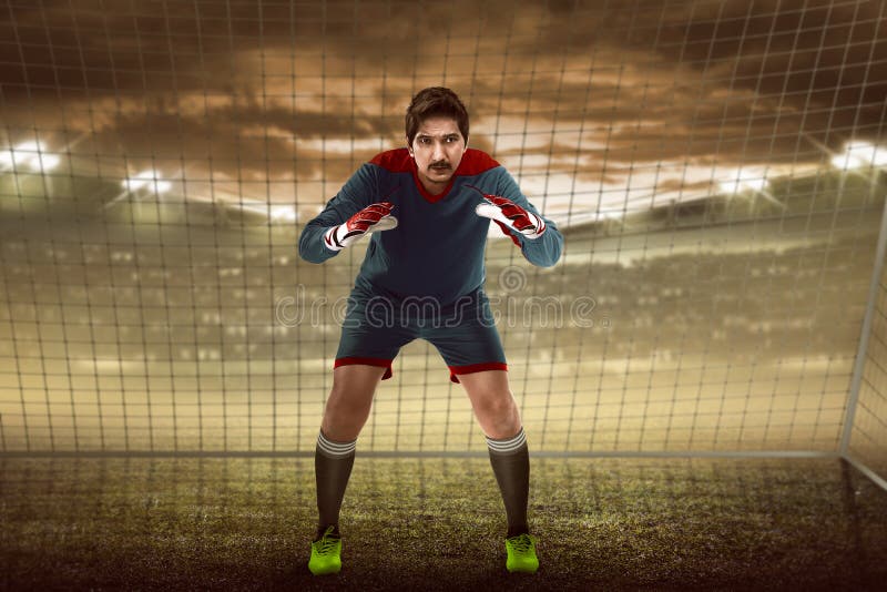 Goalkeeper in Front of Goalpost Stock Photo - Image of playing ...