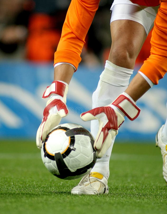 Goalkeeper Pick Up the Ball Stock Image - Image of arms, footballer ...