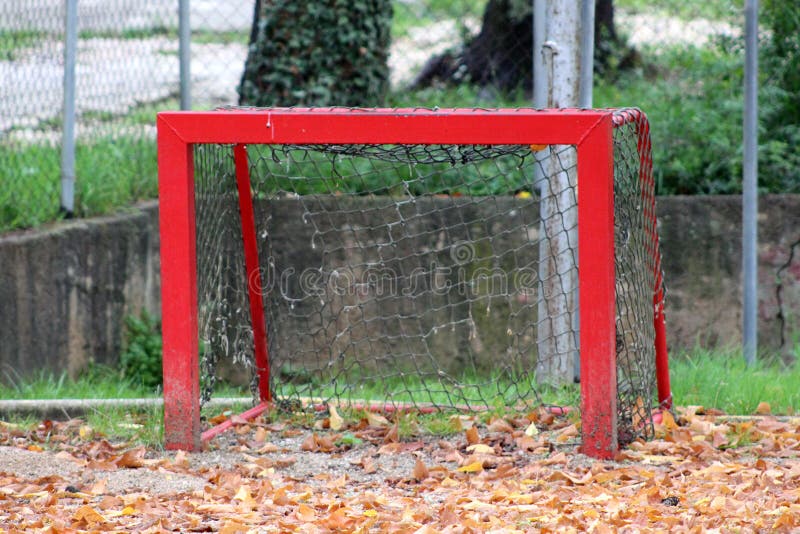 Goalpost with Broken Net on Fallen Leaves Playground Stock Photo ...