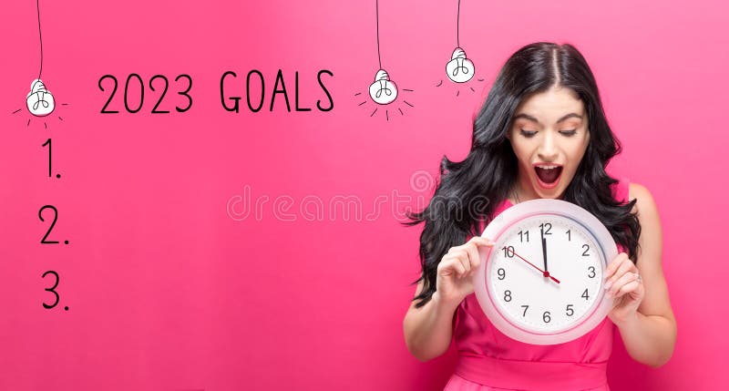 2023 Goals with Young Woman Holding a Clock Stock Image - Image of ...
