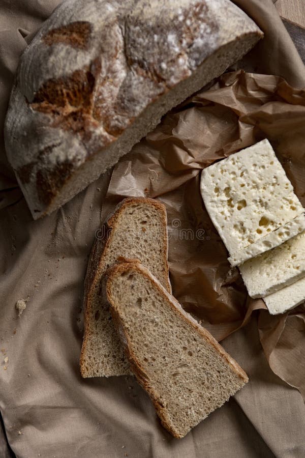 Goat or Sheep Cheese and Bread on the Table Stock Photo - Image of ...
