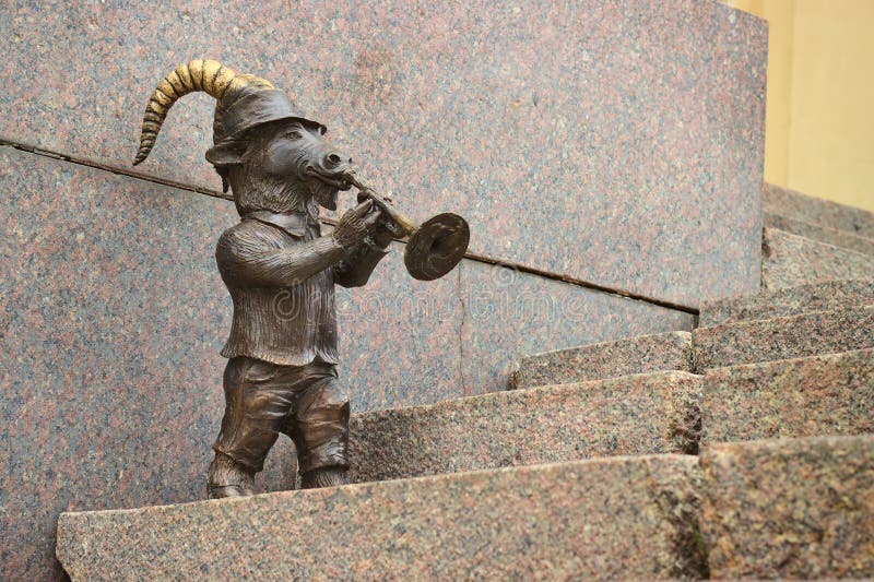 Goat Statue Holding a Trumpet in Lublin, Poland. Editorial Photography ...