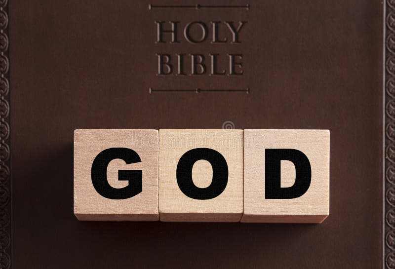 God Spelled in Blocks on a Leather Holy Bible Stock Photo - Image of ...